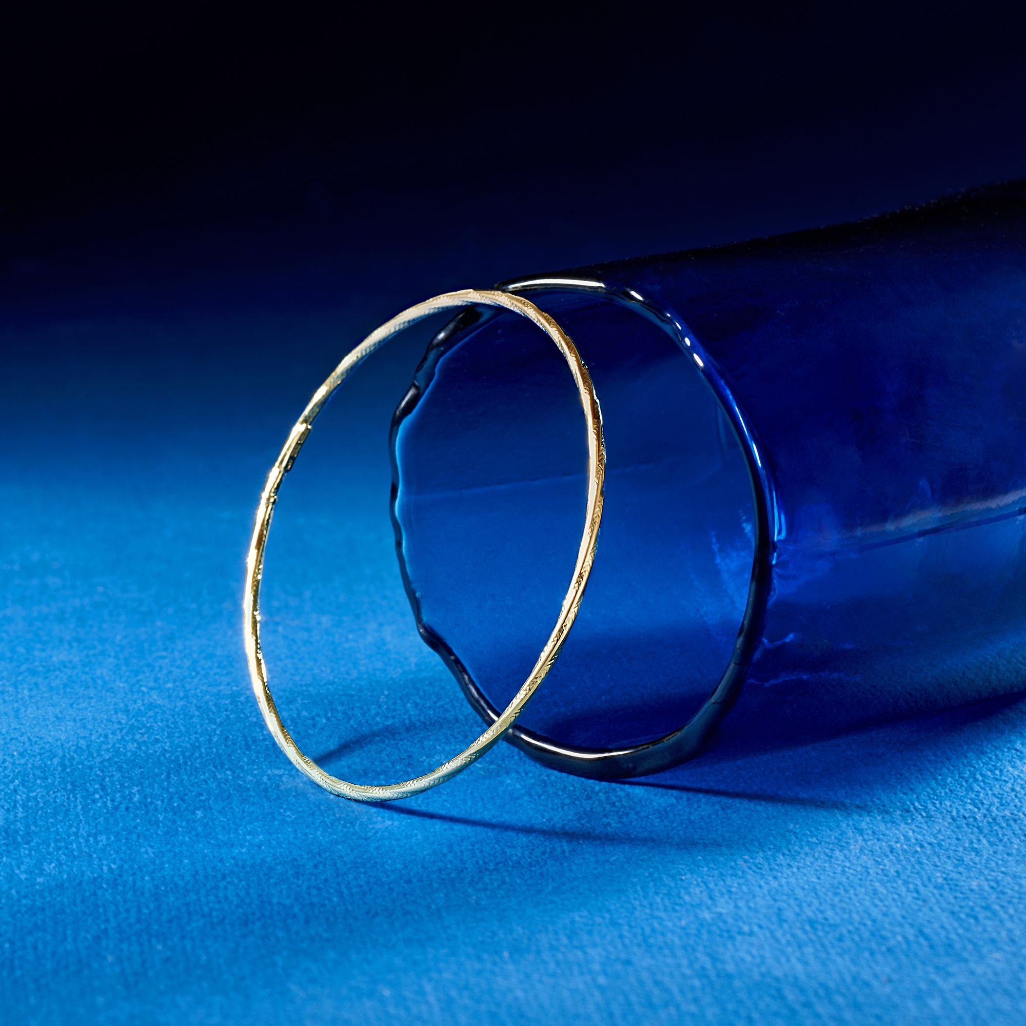 Ross-Simons Italian 14kt Yellow Gold Twisted Bangle Bracelet. 8 inches
