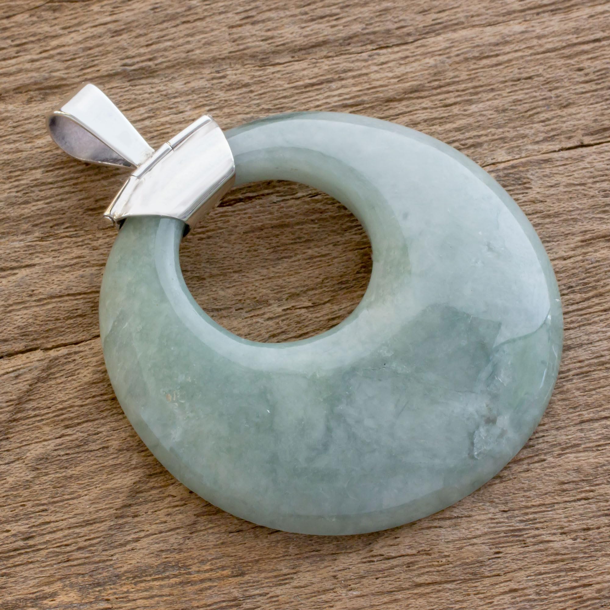 NOVICA Handmade Jade Pendant Circular Polished with .925 Sterling Silver Bail Green Guatemala [2 in L x 1.6 in W x 0.2 in D] 'Serene'