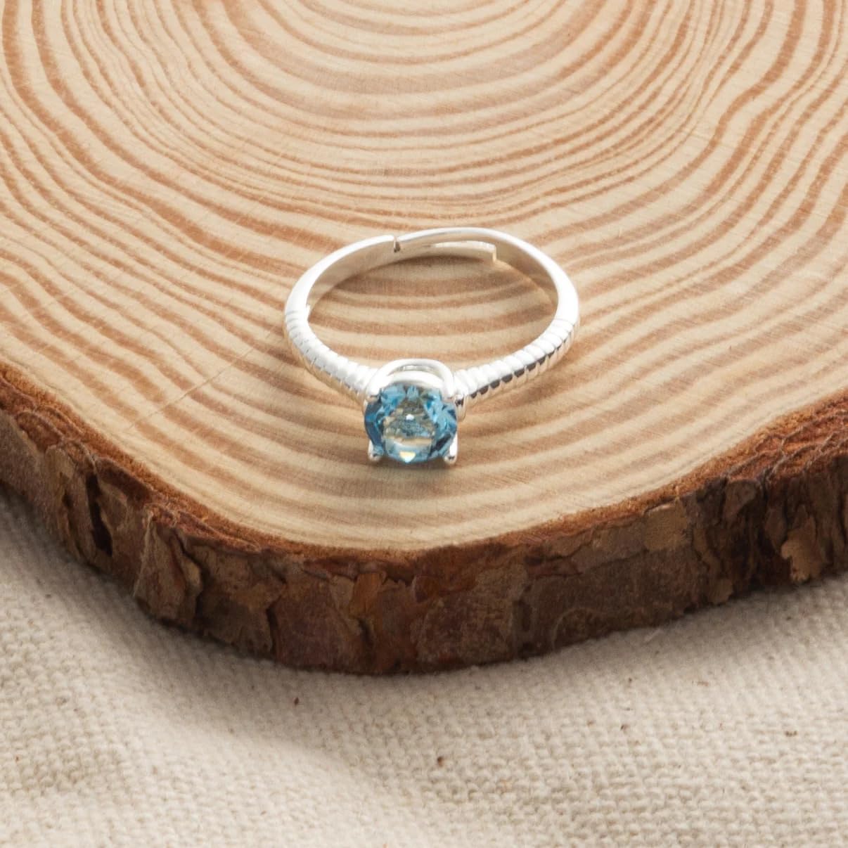 Philip Jones March (Aquamarine) Adjustable Birthstone Ring Created with Zircondia® Crystals
