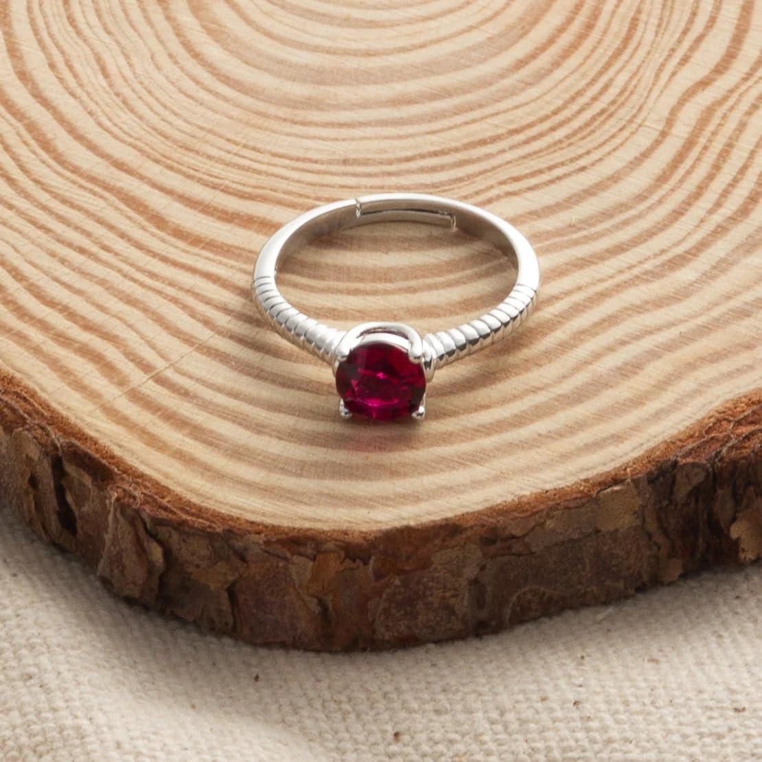 Philip Jones January (Garnet) Adjustable Birthstone Ring Created with Zircondia® Crystals