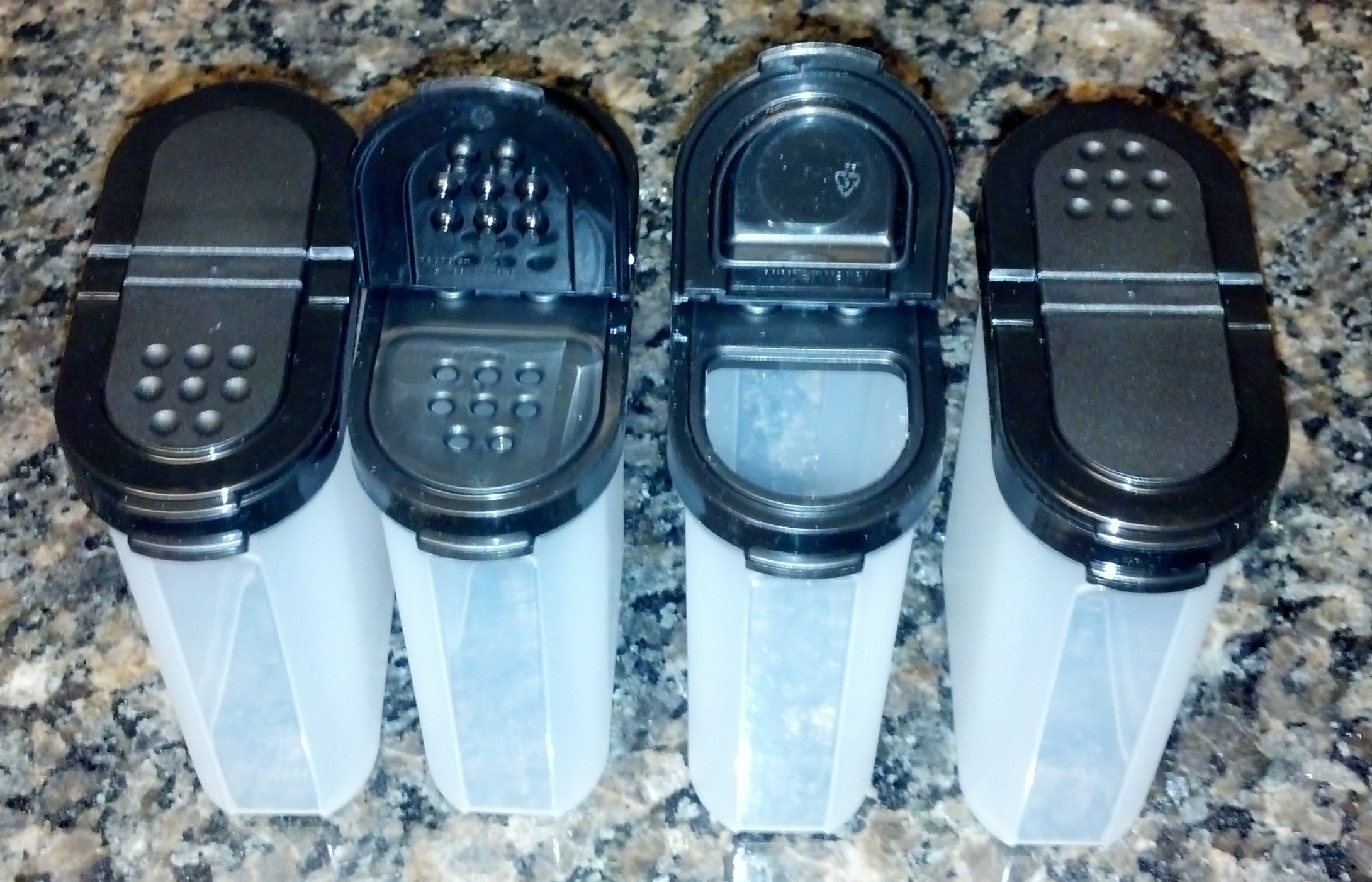 Tupperware Large Spice Shaker Set of Four. Black Seals