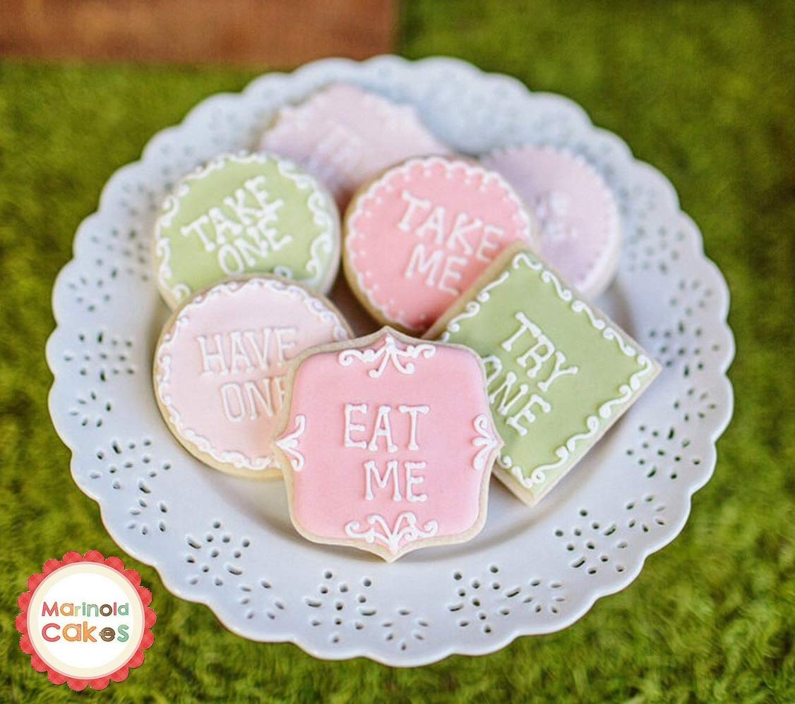 Wonderland Cookie Cutter 12 Piece Set from The Cookie Cutter Shop - Mad Hatter Hat, Cheshire Cat, Queen's Crown, Drink Me Bottle Cookie Cutters β Tin Plated Steel Cookie Cutters