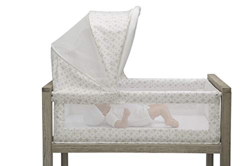 Simmons Kids Farmhouse 2-in-1 Wood Bedside Bassinet Sleeper and Changer - Portable Crib and Changing Table with High-End Wood Frame, Royal Charms