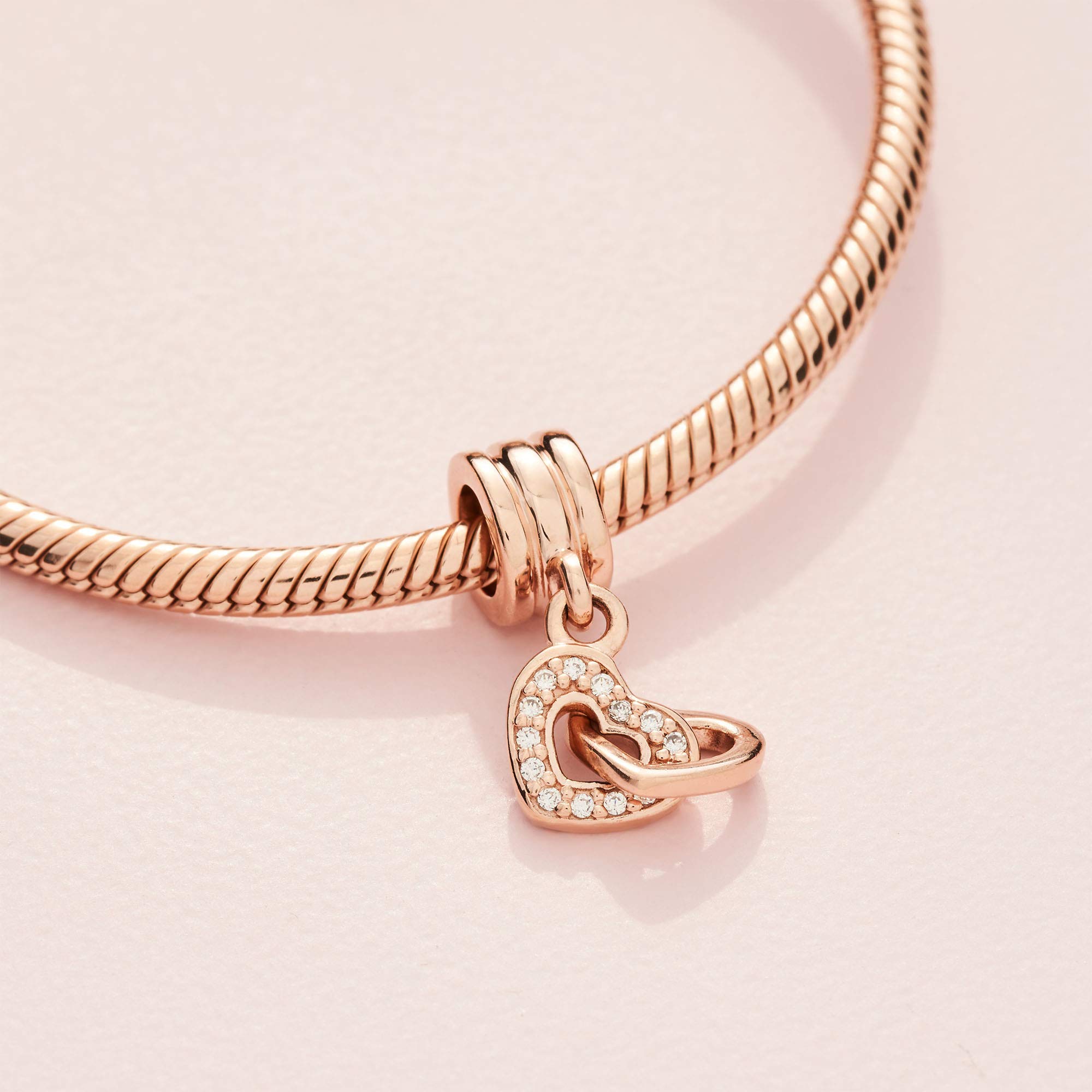 Pandora Jewelry Interlocking Hearts Dangle Cubic Zirconia Charm in Rose