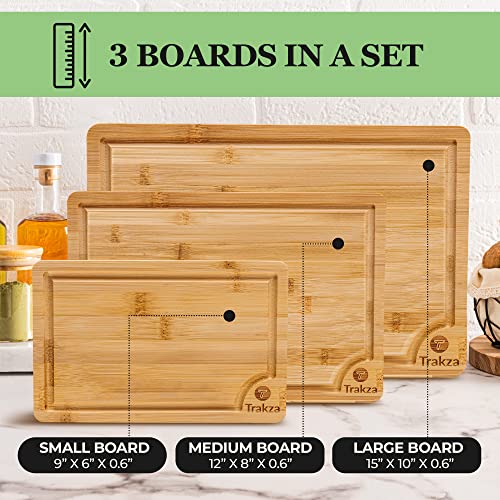TRAKZA Bamboo Cutting Board Set - Durable Kitchen Cutting Boards For Chopping Fruit, Meat, Cheese, Veggies - Deep Juice Grooves, Side Handles, Easy To Use & Clean - With Storage Holder - 9", 12", 15"