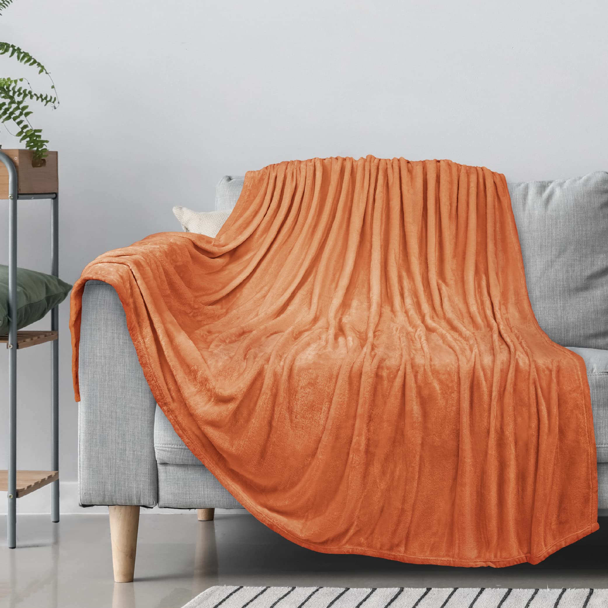 PAVILIA Orange Fleece Throw Blanket for Couch, Coral Peach Soft Fuzzy Fall Flannel Throw for Sofa, Luxury Plush Microfiber Bed Blanket, Cozy Home Halloween Velvet Gift Blanket, 50x60