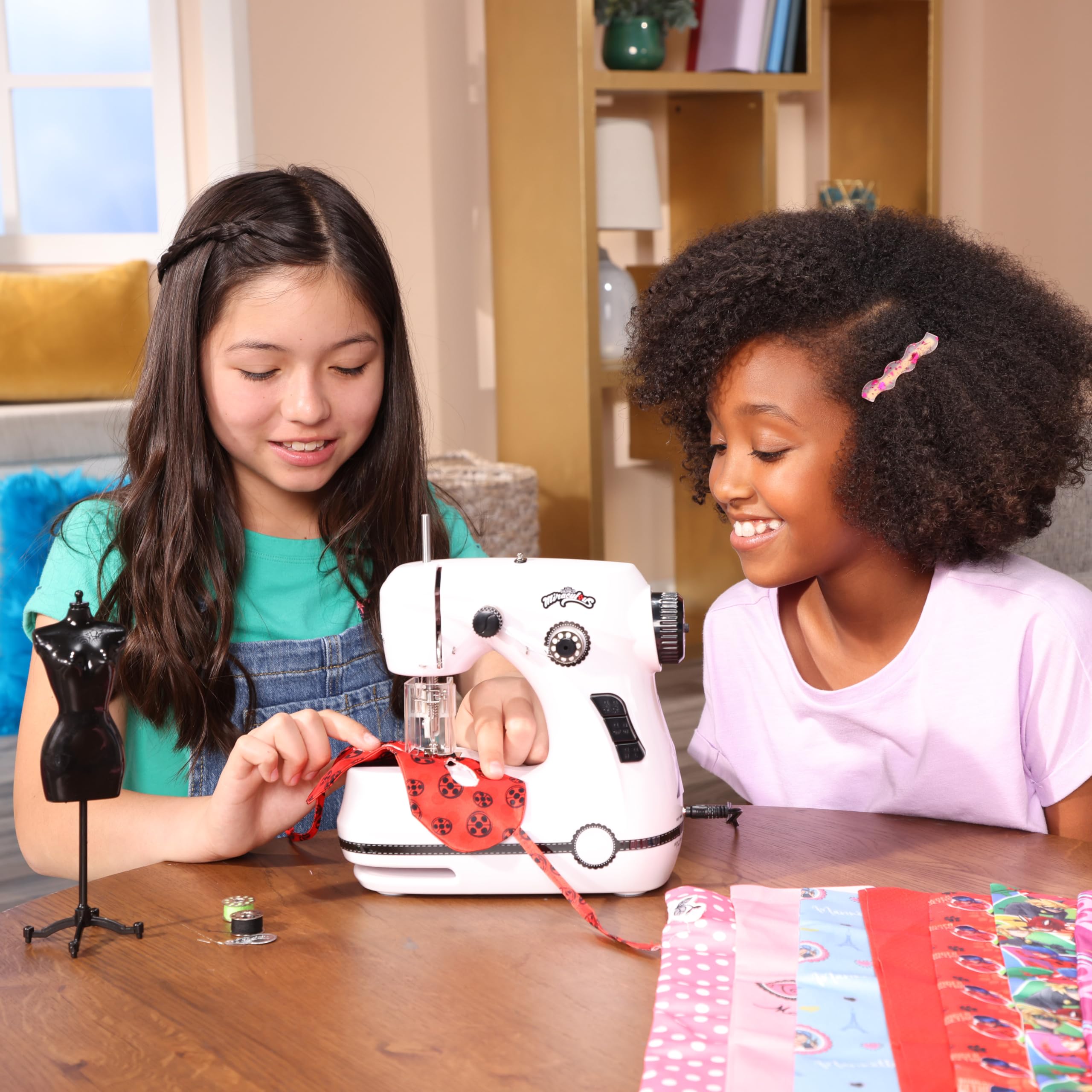 Miraculous Ladybug - Marinette's Mini Sewing Machine For Beginners And Kids, Dual Speed Portable Machine with Miraculous Fabric, Black Mannequin, Superhero Mask Cutouts, And Foot Pedal (Wyncor)