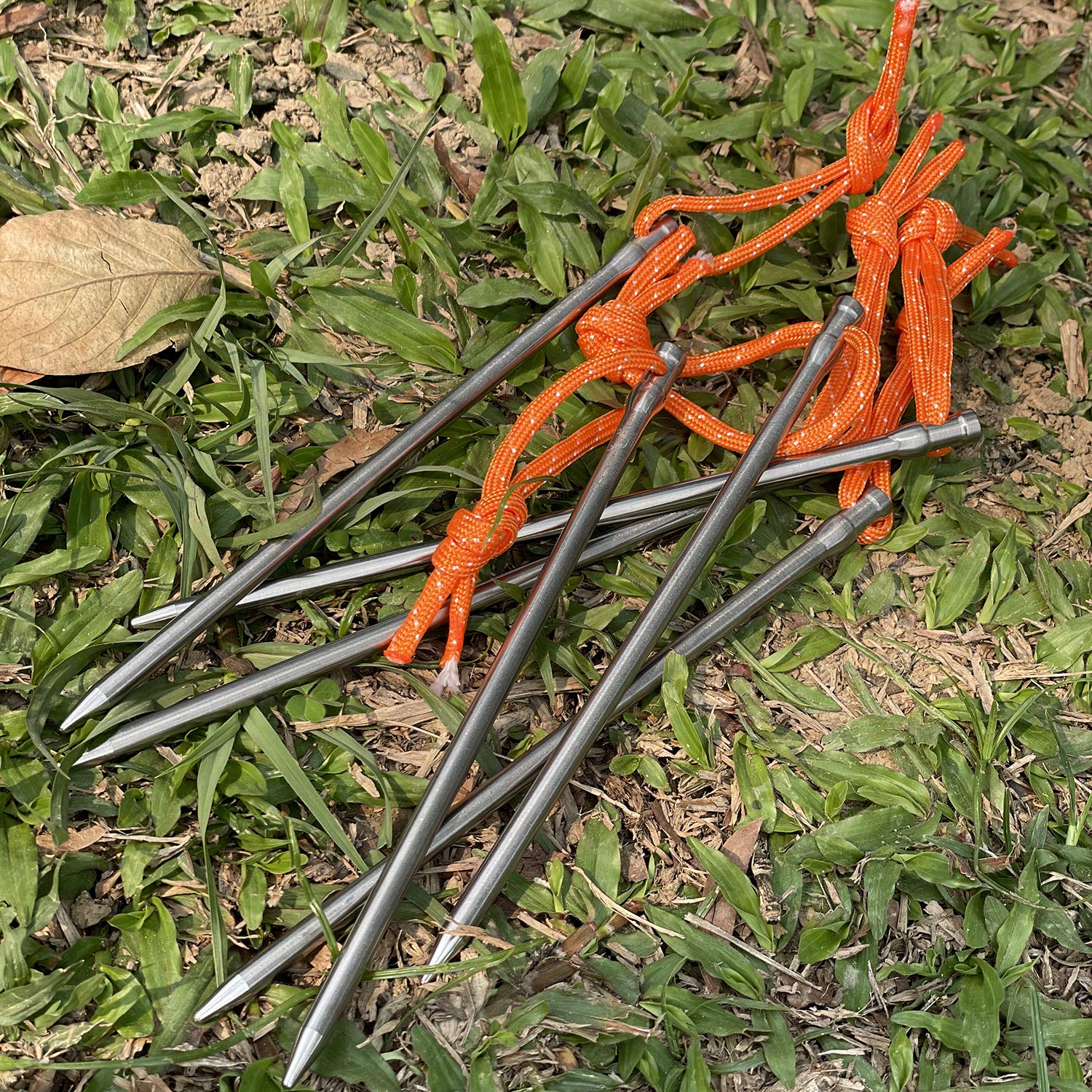 Tentock 6pcs Titanium Alloy Tent Stakes Durable Ultralight Camping Tent Pegs Windproof Tent Nails Spikes with Reflective Drawstring for Outdoor Camping Backpacking Hiking (TT0144(16.5CM))