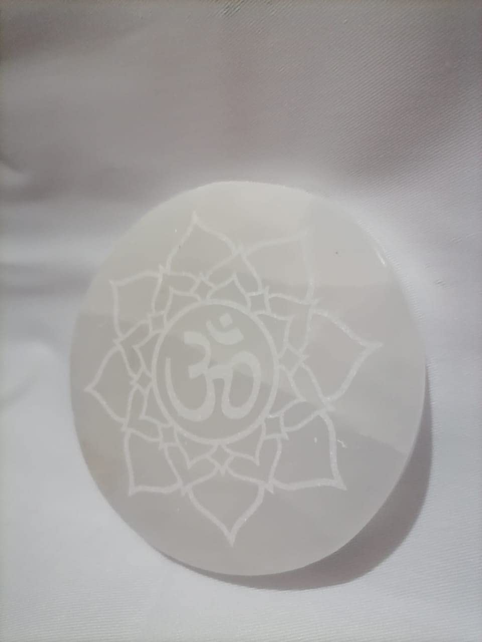 Selenite Circle Plate Laser Engraved OM Design, Cleans and Remove Negative Energy, Size Around 10×10 cm 240 gr