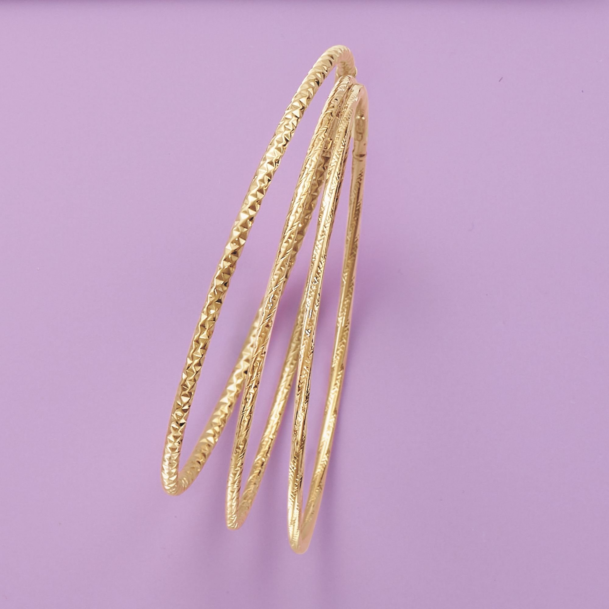 Ross-Simons Italian 14kt Yellow Gold Textured Bangle Bracelet. 7.5 inches