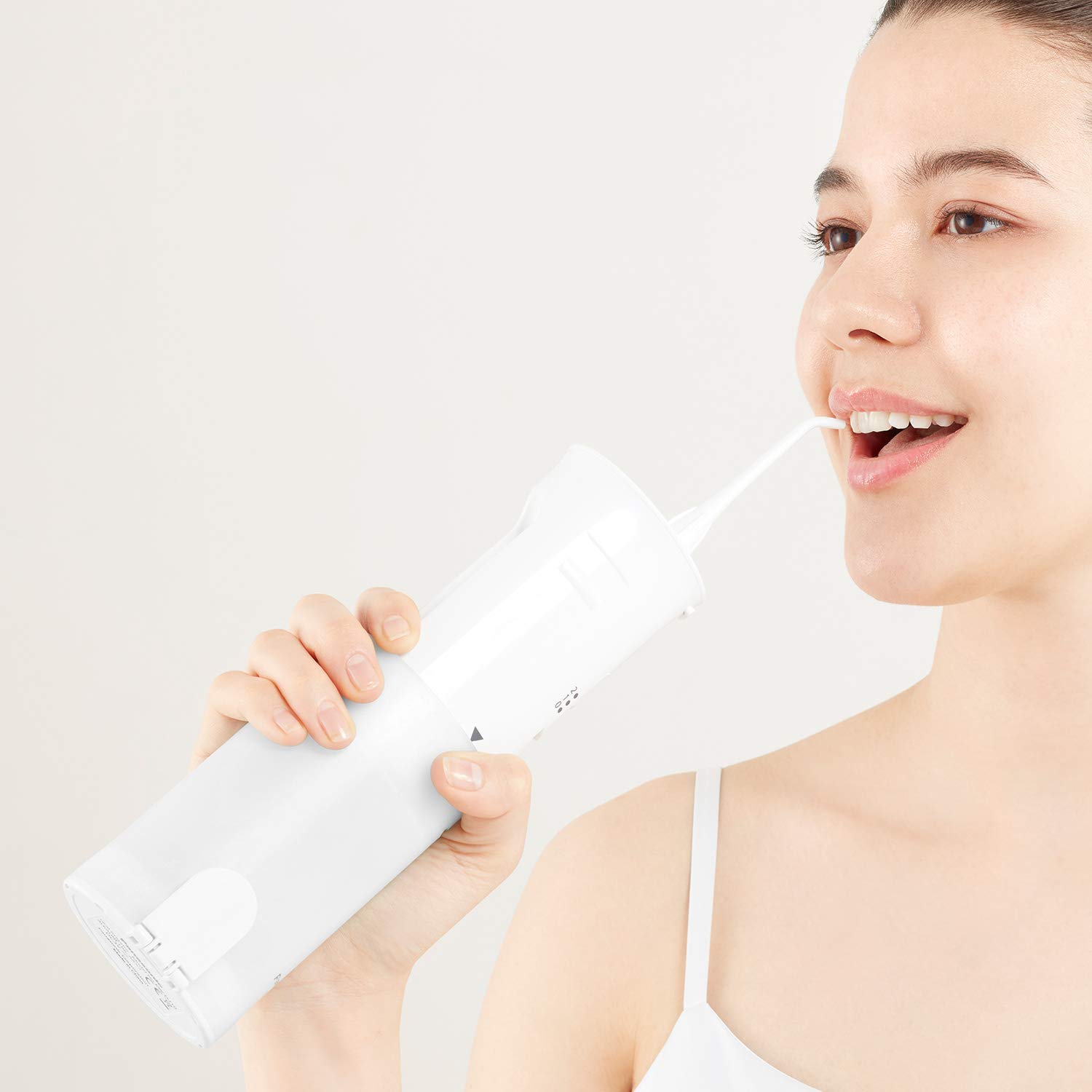 Panasonic Portable Water Flosser, 2-Speed Battery-Operated Oral Irrigator with Collapsible Design for Travel – EW-DJ10-W (White)