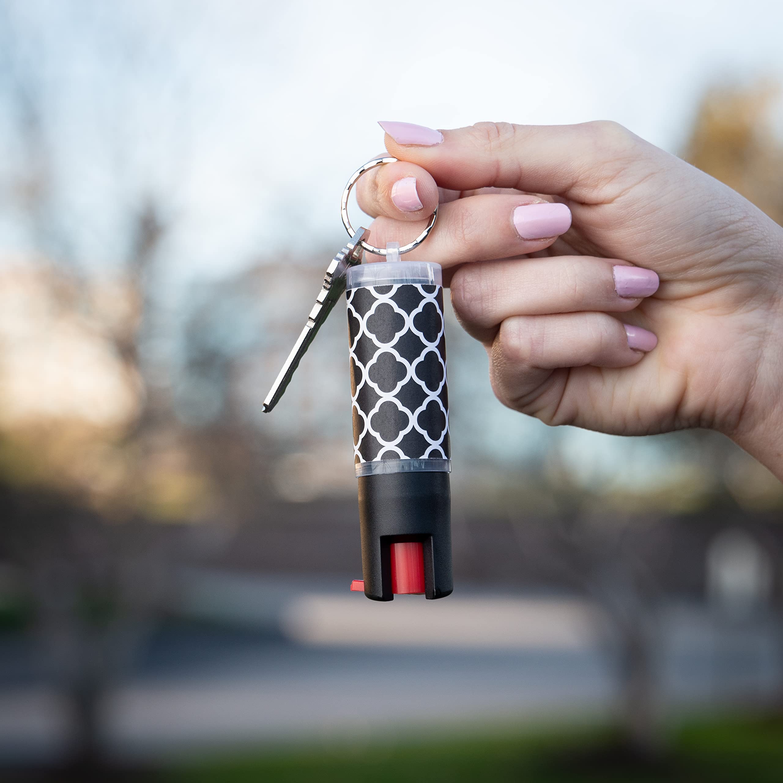 SABRE RED Pepper Spray Keychain for Women, Mini Case with Cute Design, Reinforced Twist Lock Prevents Accidents, Same Maximum Strength Formula Used by Police, 10-Foot (3m) Range with 25 Bursts