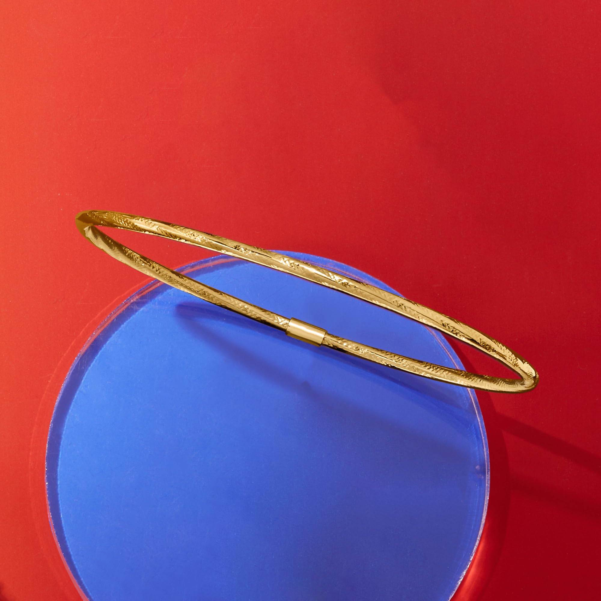 Ross-Simons Italian 14kt Yellow Gold Twisted Bangle Bracelet. 8 inches