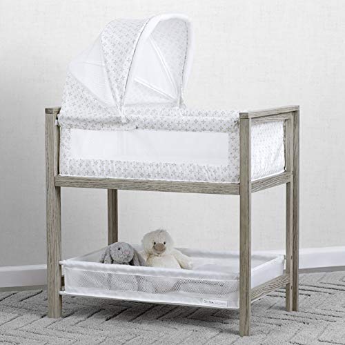 Simmons Kids Farmhouse 2-in-1 Wood Bedside Bassinet Sleeper and Changer - Portable Crib and Changing Table with High-End Wood Frame, Royal Charms