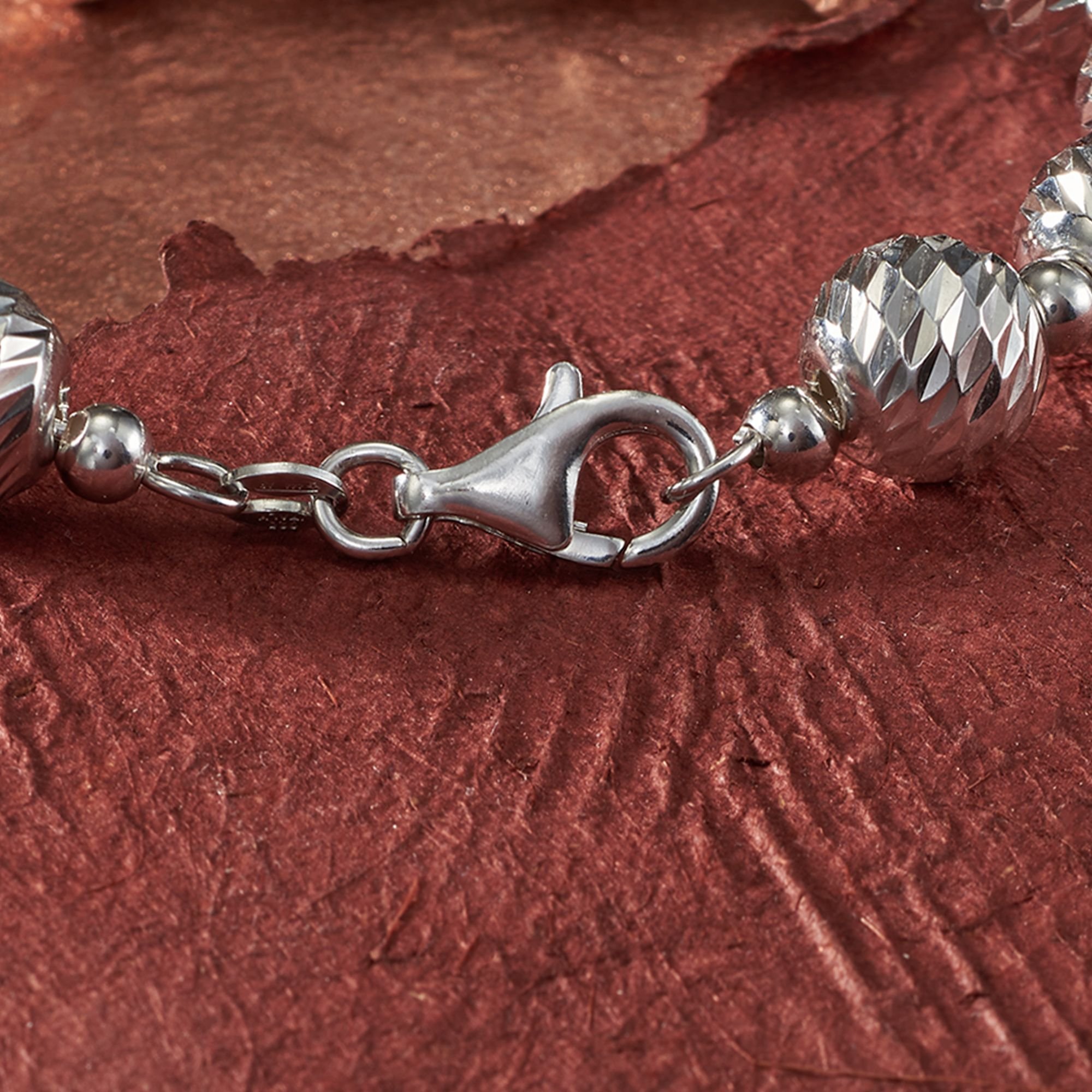 Ross-Simons Italian 4mm and 10mm Sterling Silver Diamond-Cut and Polished Bead Bracelet. 7.5 inches