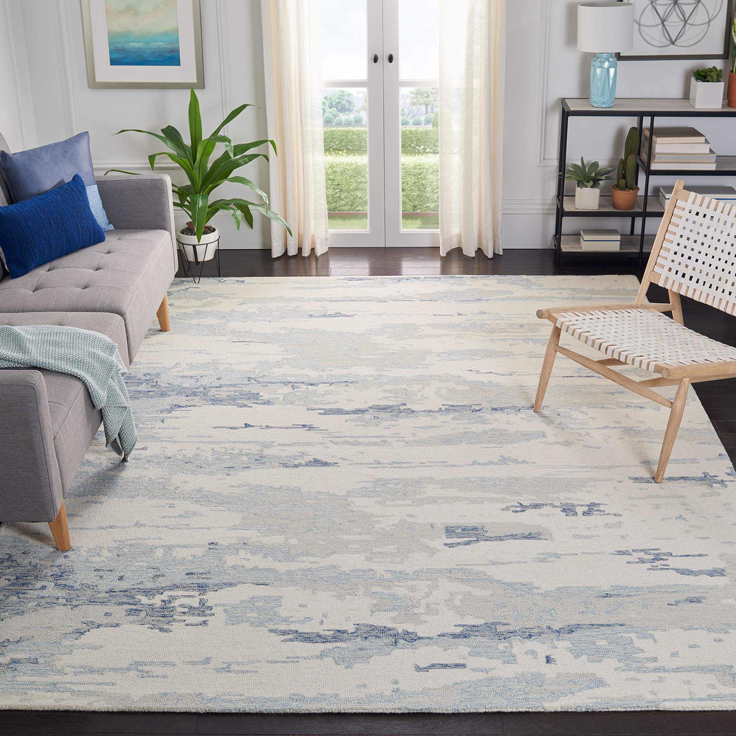 SAFAVIEH Abstract Collection Area Rug - 8' x 10', Ivory & Blue, Handmade Abstract Wool, Ideal for High Traffic Areas in Living Room, Bedroom (ABT465A)