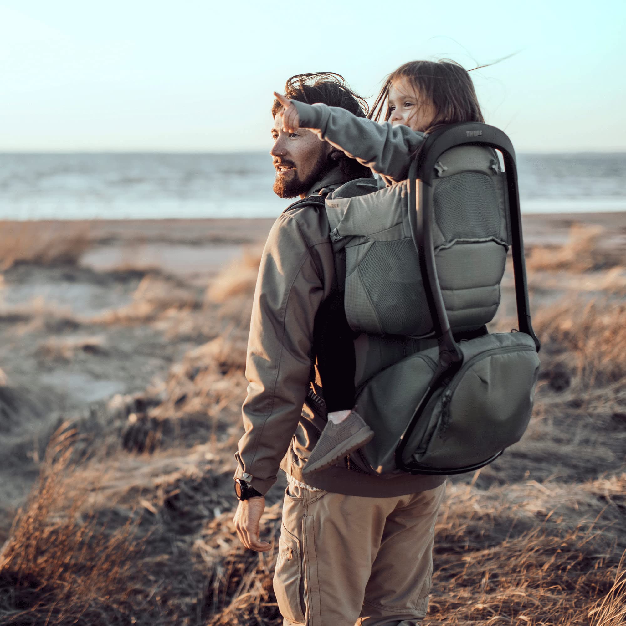 Thule Sapling Child Carrier Backpack - Machine Washable Seat - Self-Standing Frame - Adjustable Padded Straps for Parents - Ergonomic seat with Under-Leg Support for Child - UPF 50 Sunshade