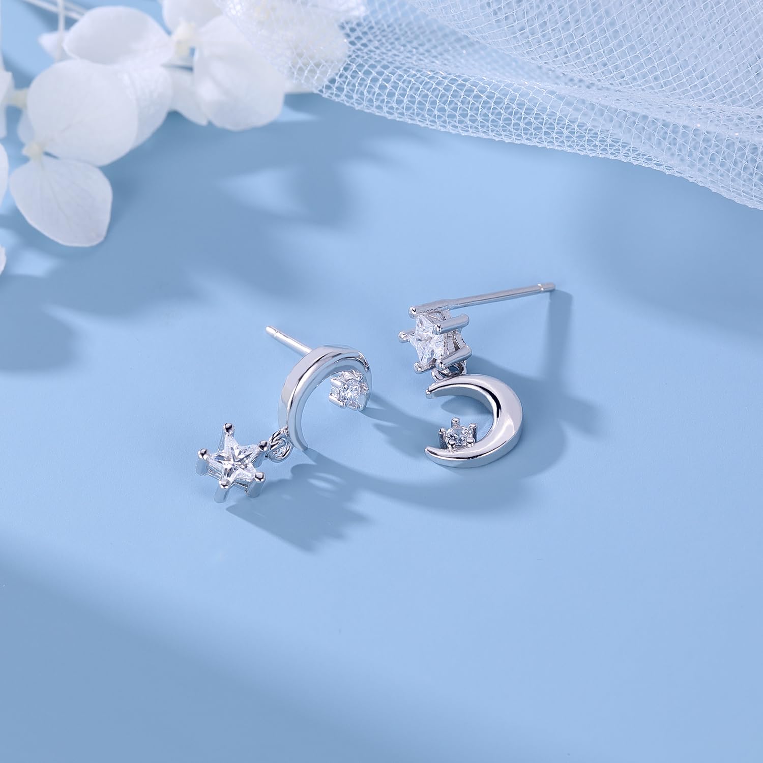 SLUYNZ 925 Sterling Silver CZ Crystal Star Moon Studs Earrings for Women Sparkling Asymmetric Studs Earrings (Star Moon Earrings)