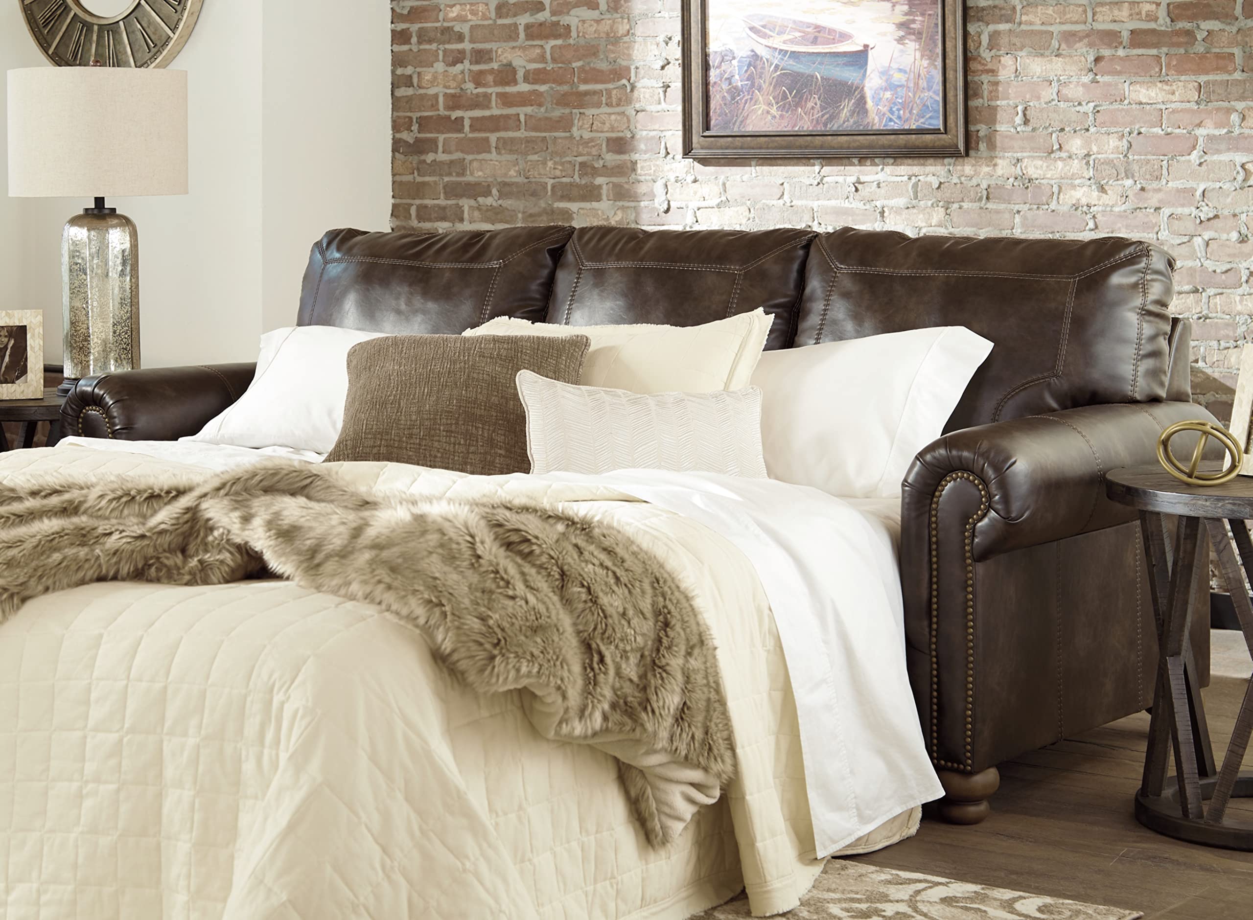 Signature Design by Ashley Nicorvo Traditional Faux Leather Queen Sofa Sleeper with Gold Nailhead Trim, Brown