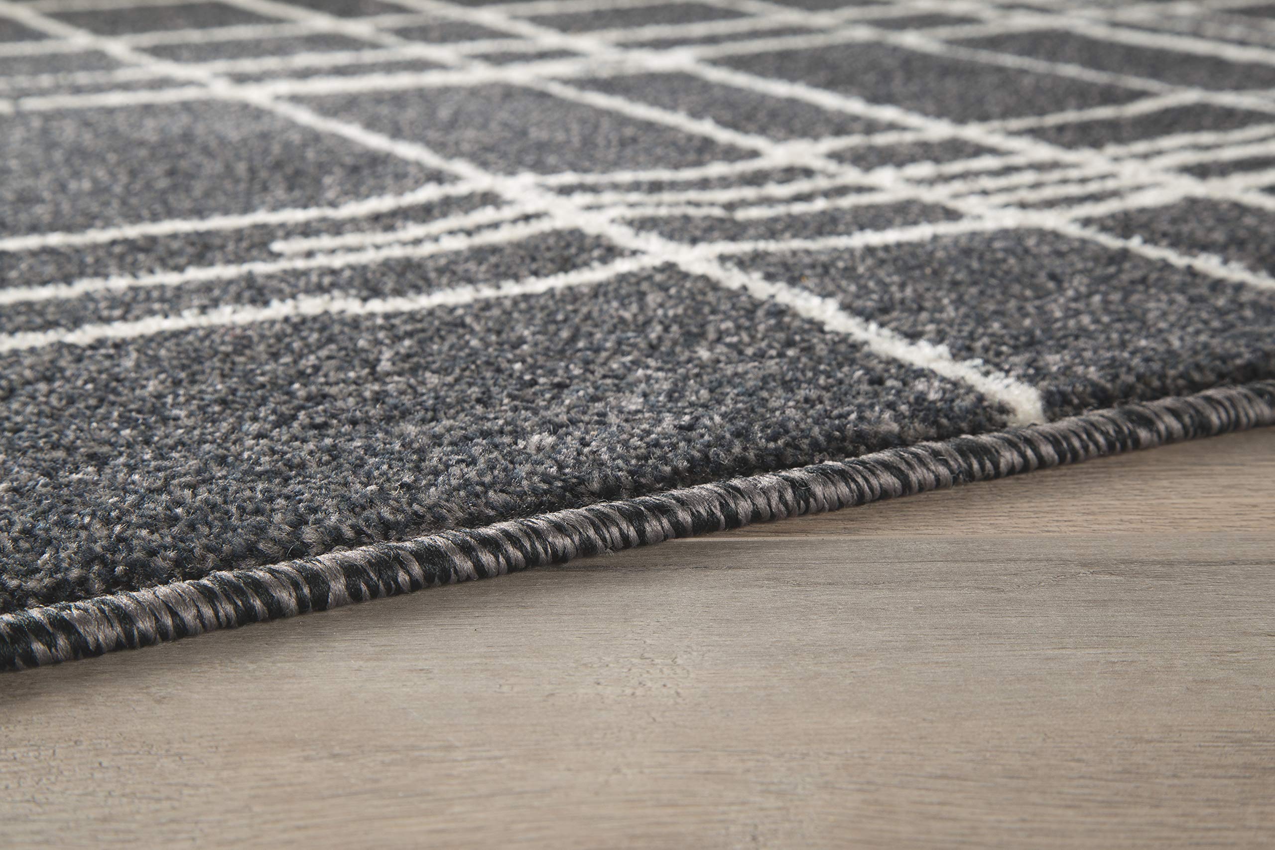 Signature Design by Ashley Jai Spindled Cross Hatch 5 x 7 ft Medium Pile Rug, Black & White