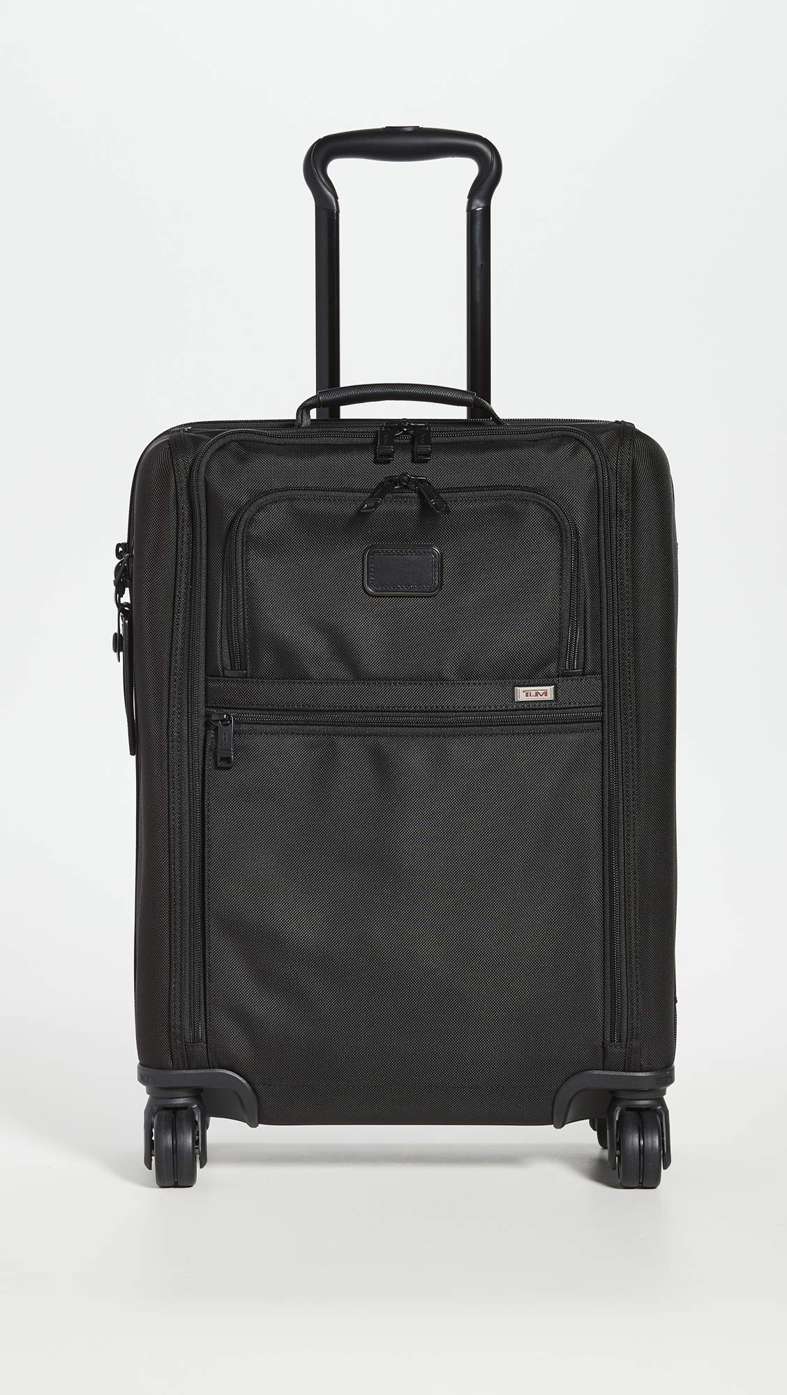 TUMI - Alpha International Slim Super Leger Carry-On - 22 Inch Rolling Suitcase for Men and Women - Black