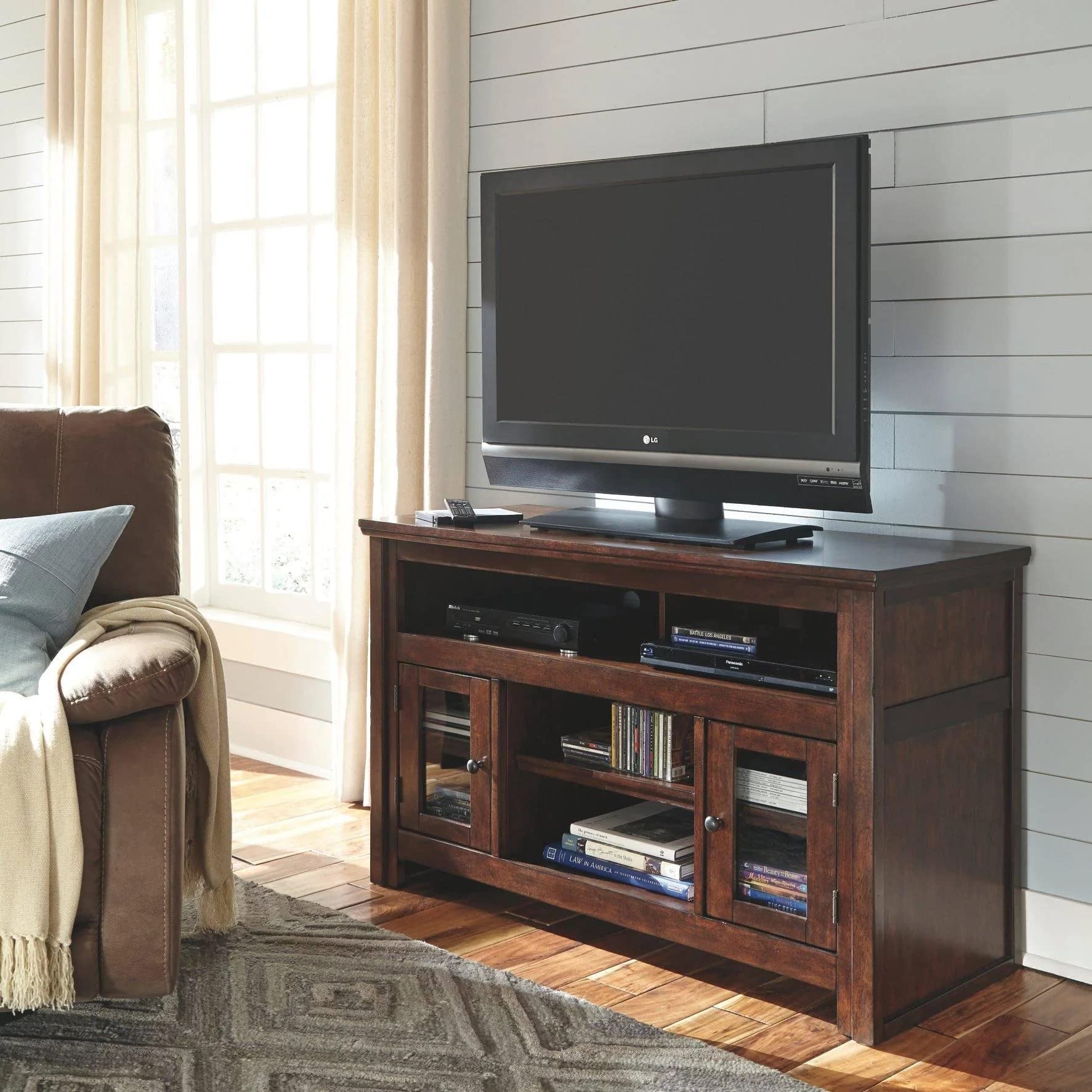 Signature Design by Ashley Harpan Traditional TV Stand Fits TVs up to 58", Adjustable Shelf and 2 Cabinets For Storage, Brown