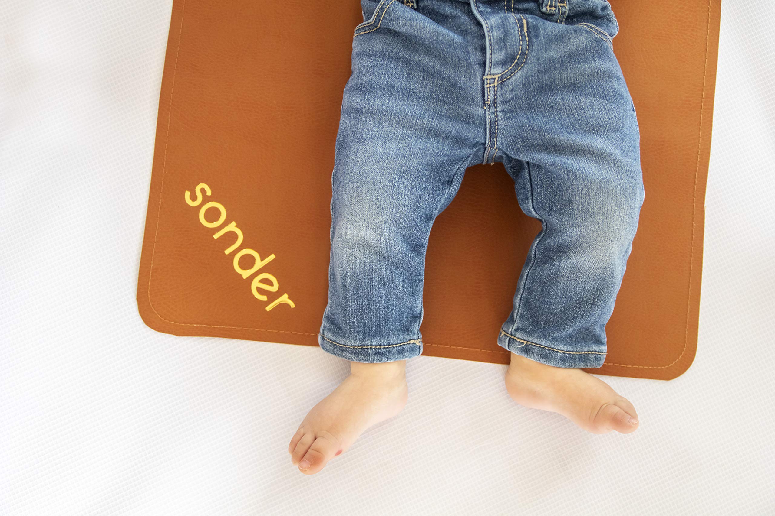 SONDER Double Sided Vegan Leather Changing Mat - Infant and Toddler Multipurpose Portable Waterproof Diaper Pad - Compact for Travel - Deluxe Diaper Changer (14" x 22", Sugar Almond + Honey Gold)