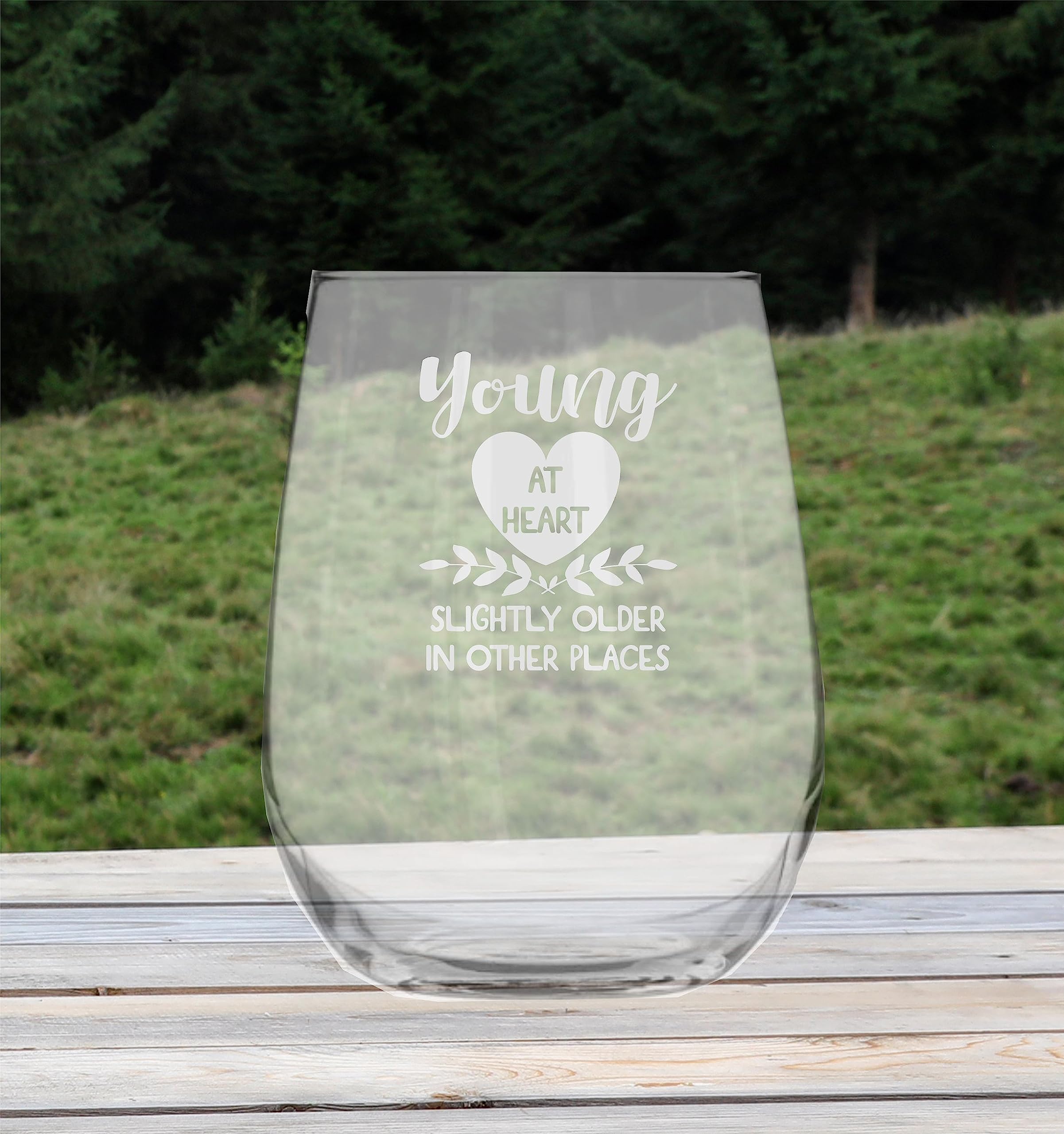 Young at Heart, Slightly Older in Other Places - 15 oz Stemless Wine Glass - Funny Birthday Party Present - Gift for mom, dad, sister or partner in wine