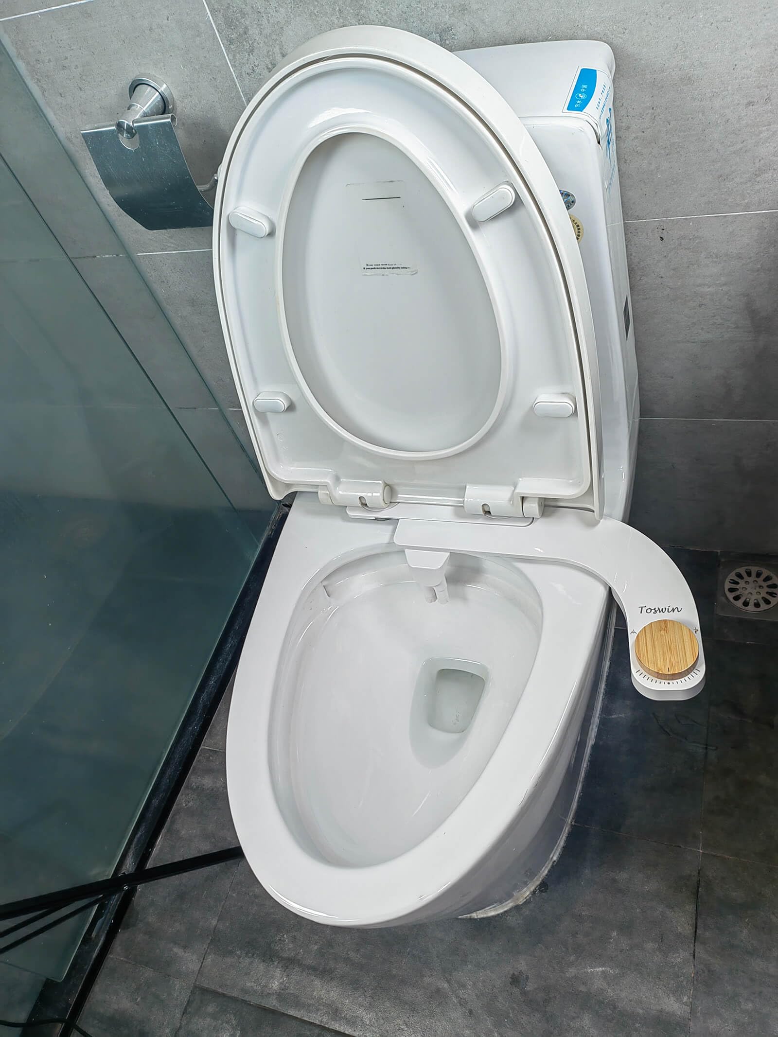 Toswin Left Hand Bidet Left Handed Bidet Ultra Slim Bidet Left Side Control Clear Rear Bidet Attachment for Toilet with Dual Front & Rear Nozzles and Adjustable Water Pressure -Bamboo Knob