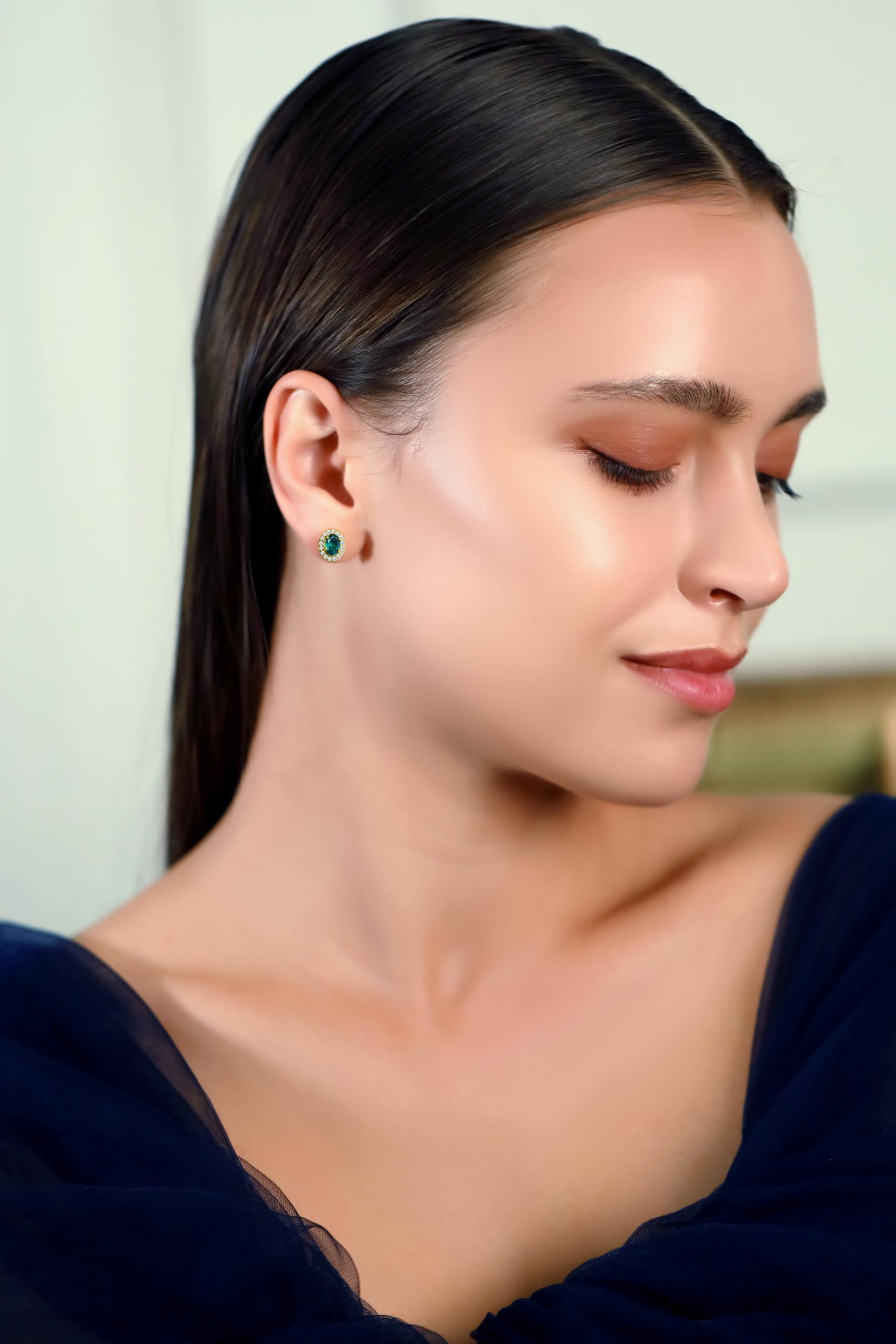 Yellow Gold Flashed Sterling Silver Simulated Emerald and Cubic Zirconia Accents Oval Halo Stud Earrings