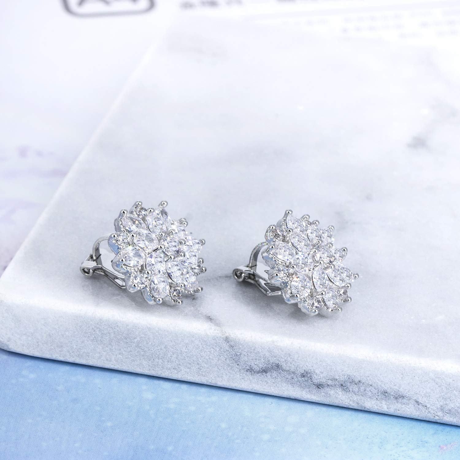 YOQUCOL Bright Cubic Zirconia Crystal Snowflake Flower Shape Clip On Stud Non Pierced Earrings For Women