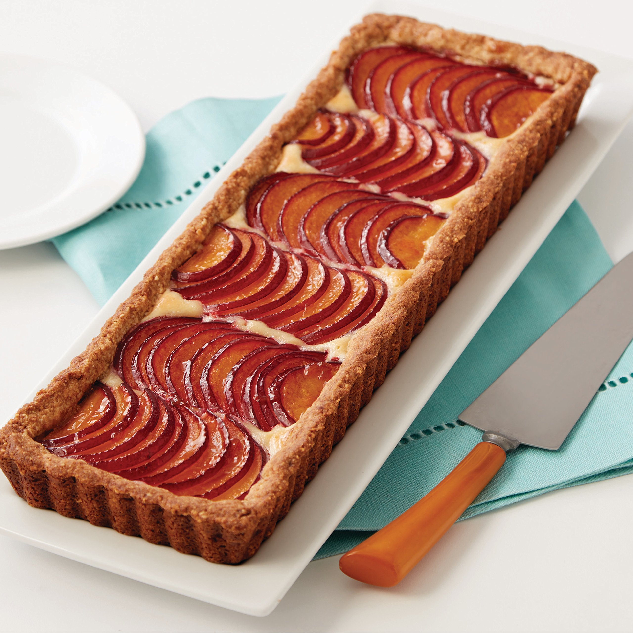Wilton Extra Long Non-Stick Tart and Quiche Pan, the Fluted Edges on Your Tarts and Quiches will Add a Touch of Flair, 14 x 4.5-Inch