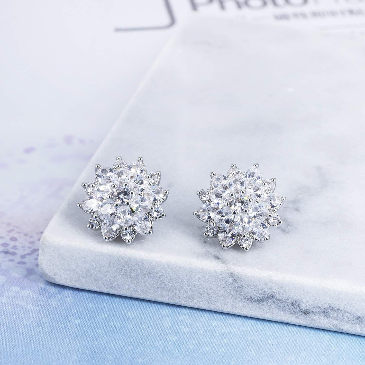 YOQUCOL Bright Cubic Zirconia Crystal Snowflake Flower Shape Clip On Stud Non Pierced Earrings For Women