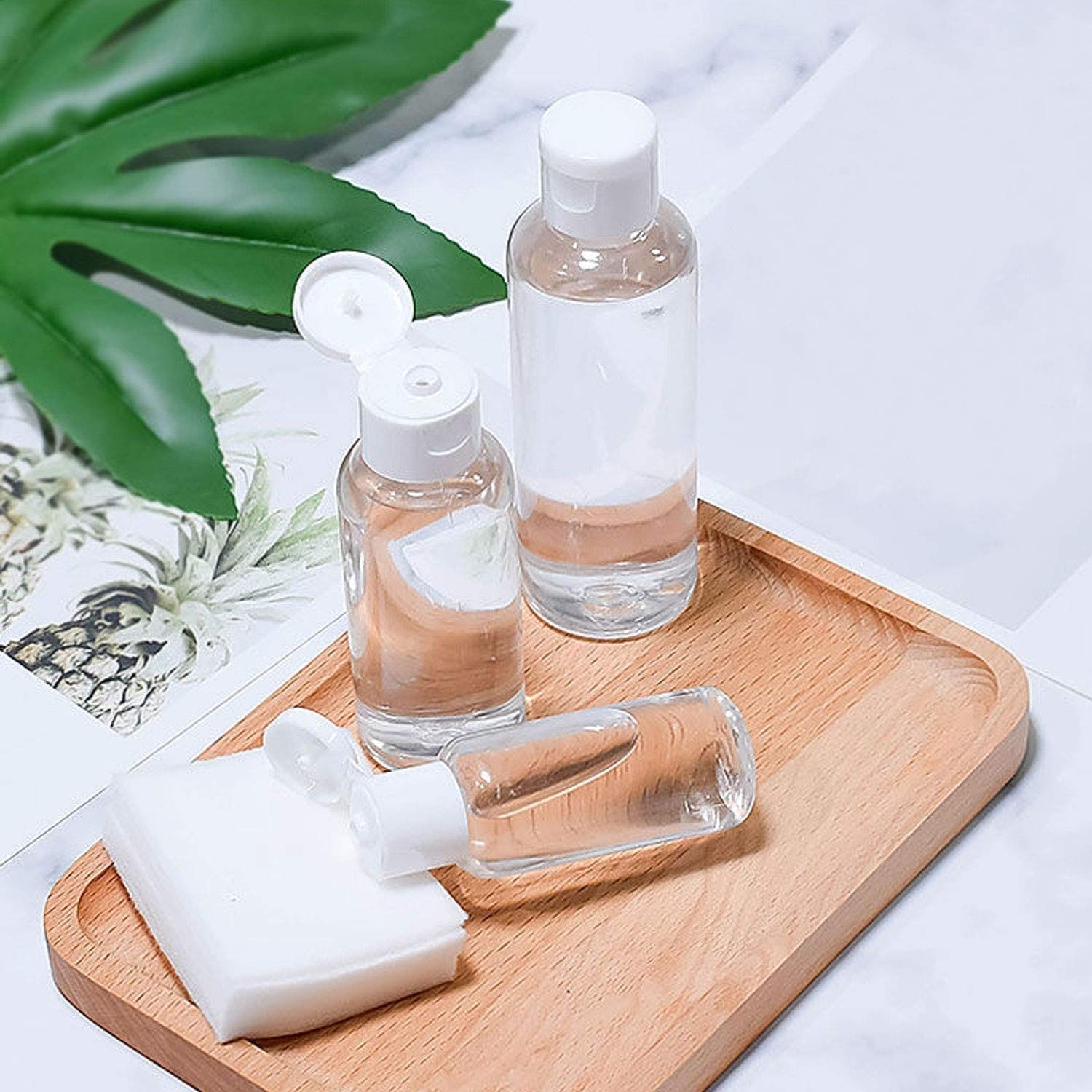 Woaiwo-q Travel Bottles TSA Approved,2 oz Plastic Bottles Small Squeeze Bottles Leak Proof Silicone Travel Size Containers with Flip Cap (30 Bottles)