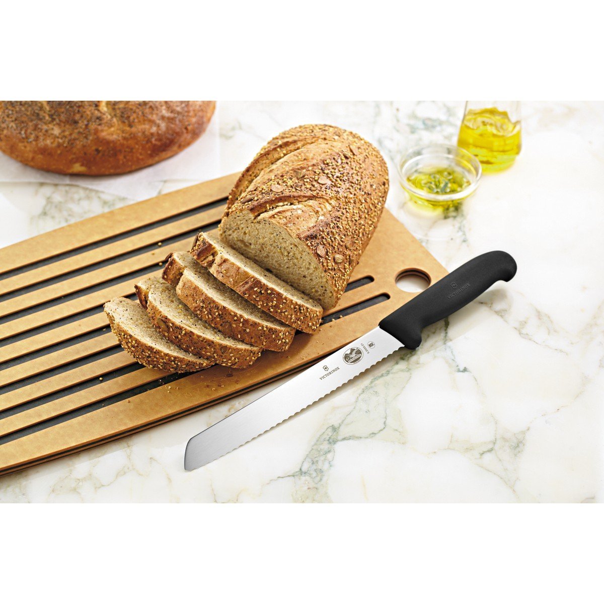 Victorinox Bread, 8" Serrated, Slant Tip, 1.50" at Black Fibrox Pro Handle