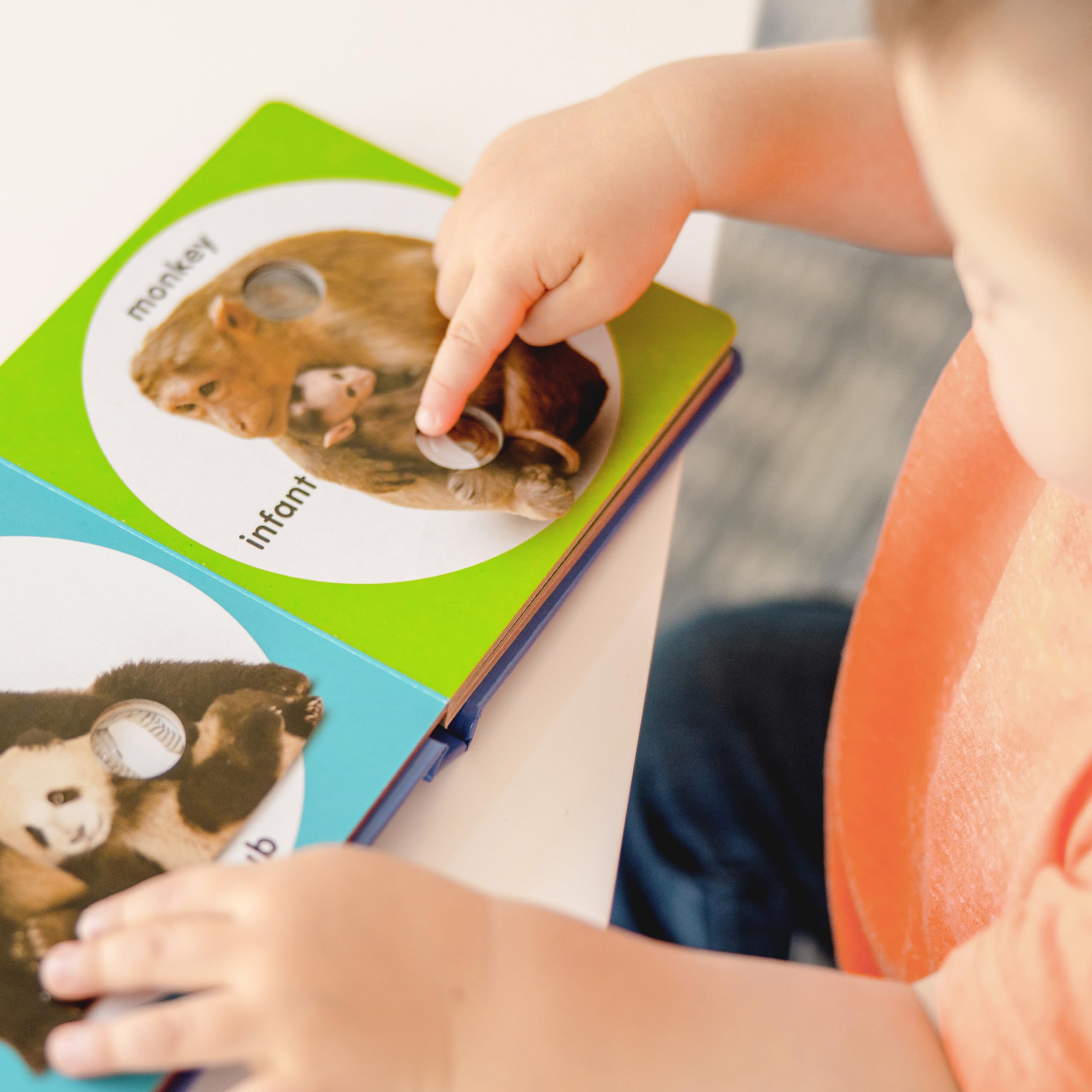 Melissa & Doug Children’s Book – Poke-a-Dot: Wild Animal Families (Board Book with Buttons to Pop)